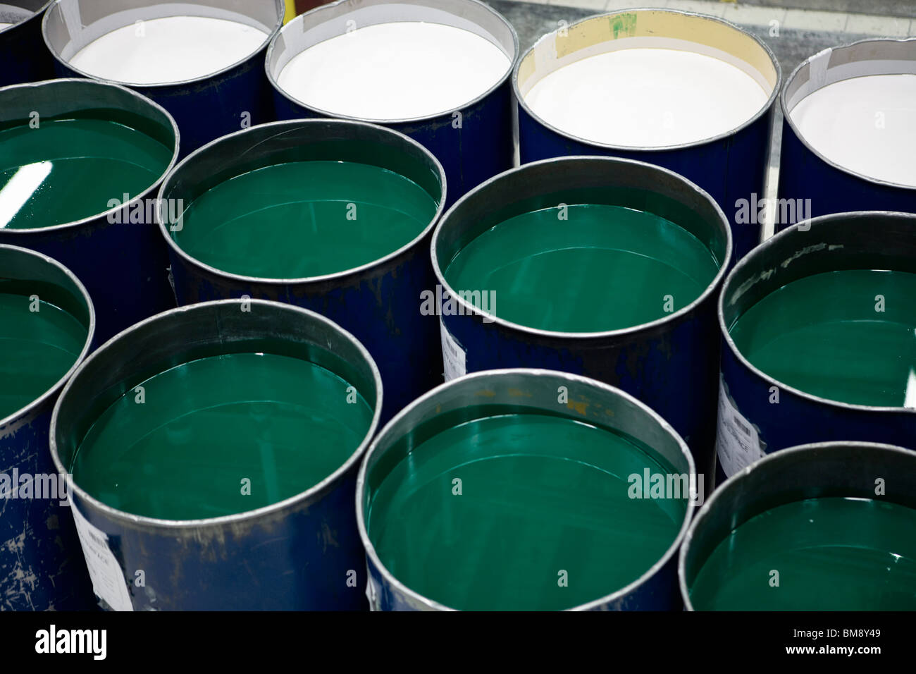 Fabric coating plant, metal drums containing a liquid plasticizer used ...