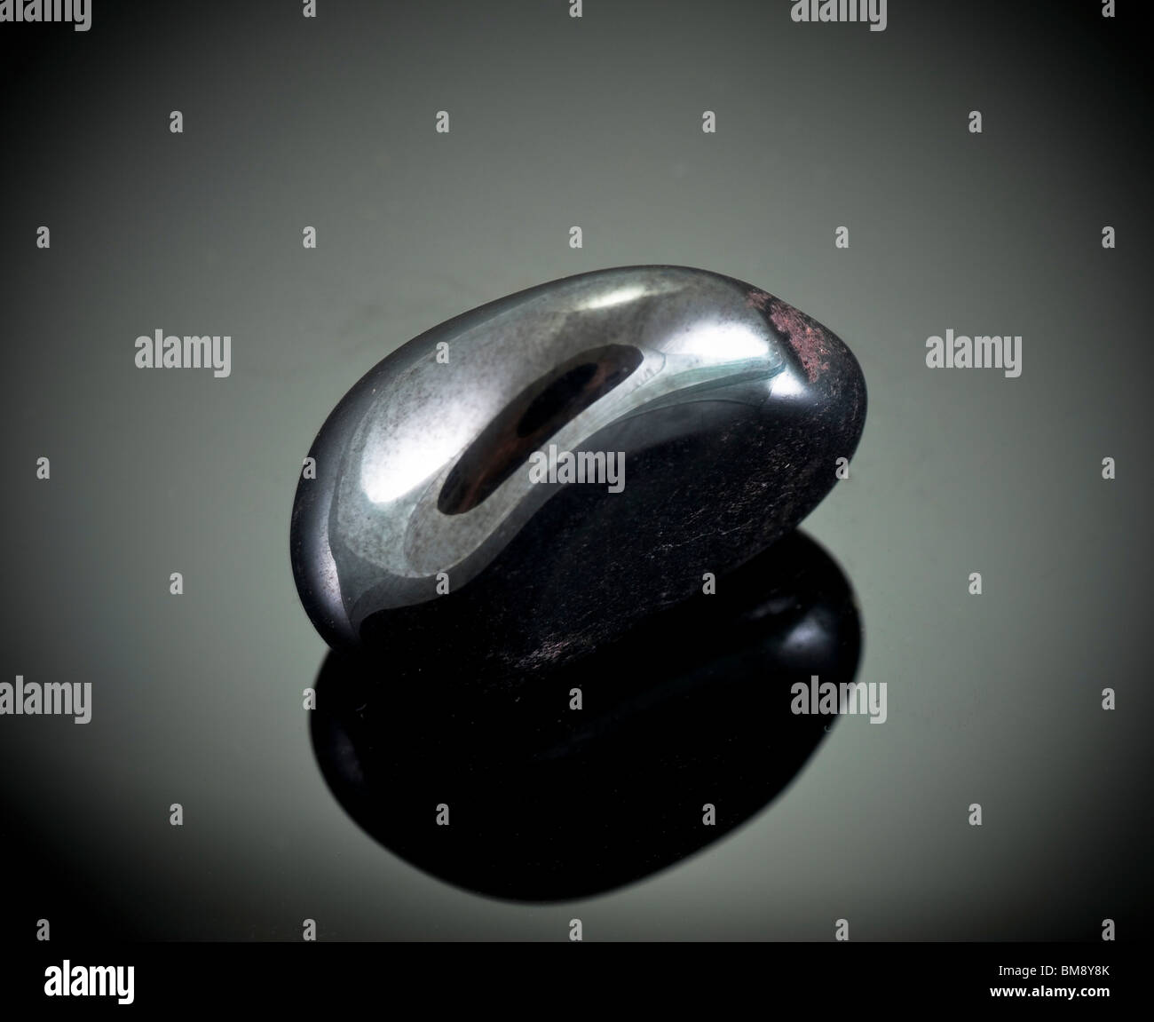 Cutout of a haematite gemstone on black background Stock Photo - Alamy