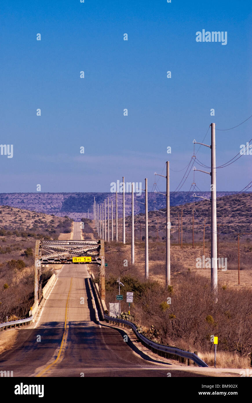 New power line and Pecos River bridge on Highway US-290 at sunset in ...