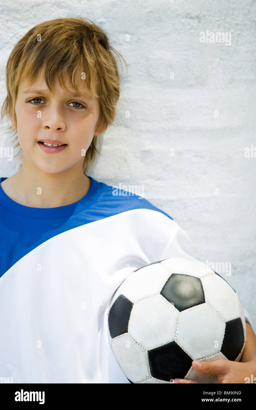 Young soccer player, portrait Stock Photo - Alamy