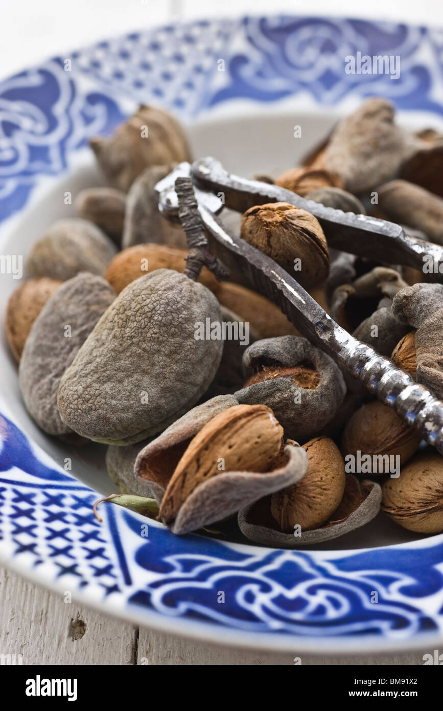 Cracking almonds hi-res stock photography and images - Alamy