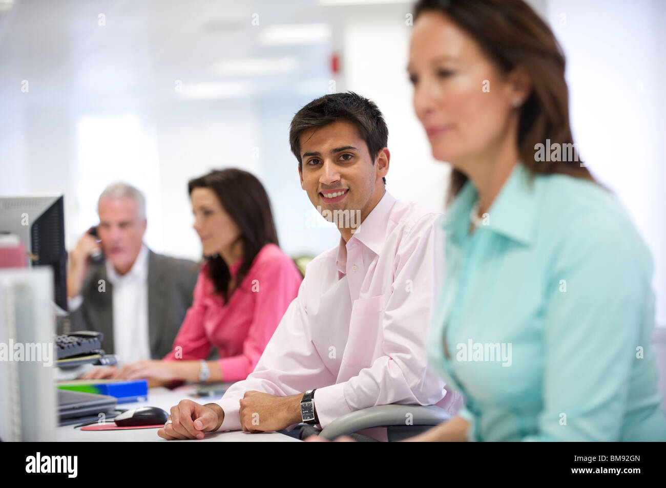 Young British Asian man in the office Stock Photo - Alamy