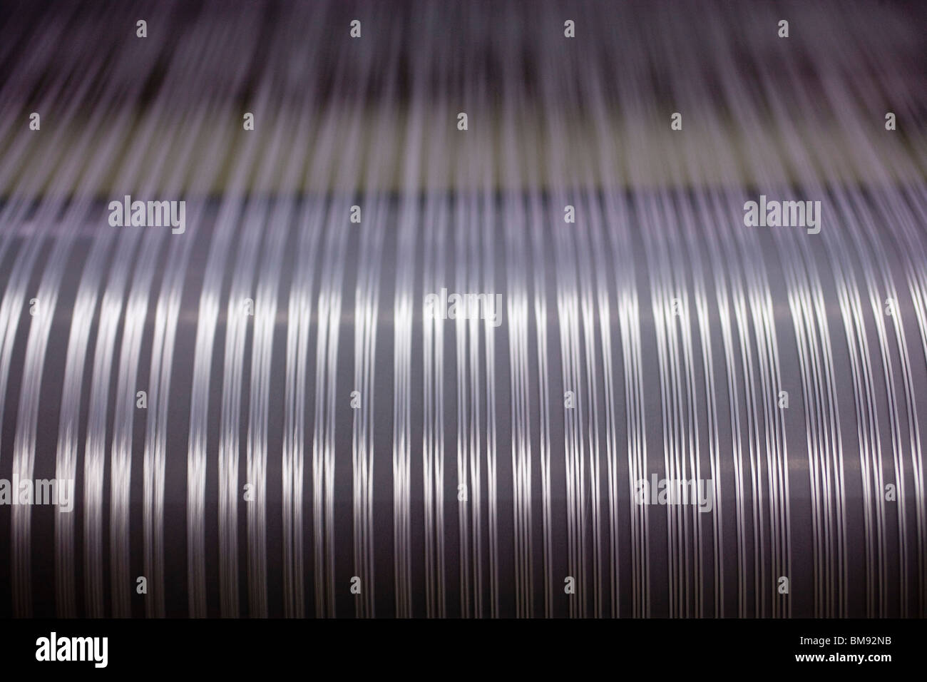 Weaving mill, lap of threads on loom Stock Photo - Alamy