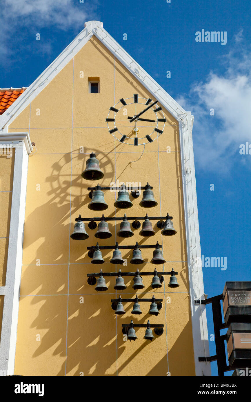 A building with bells and a decorative clock tower in Punda, Willemstad ...