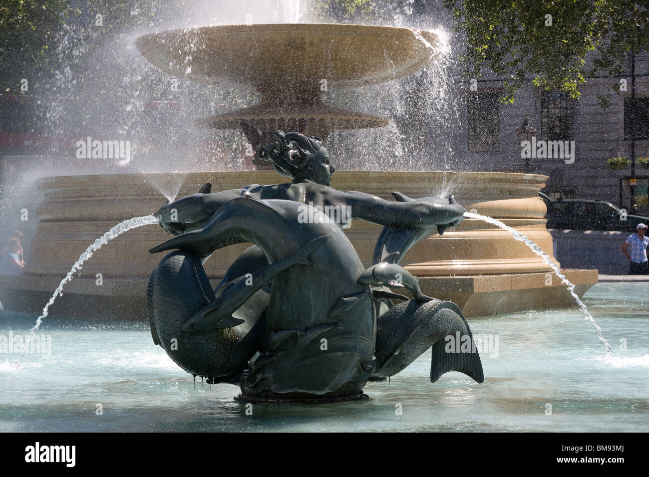 spouting water statue in fountain picturesque cool Stock Photo - Alamy