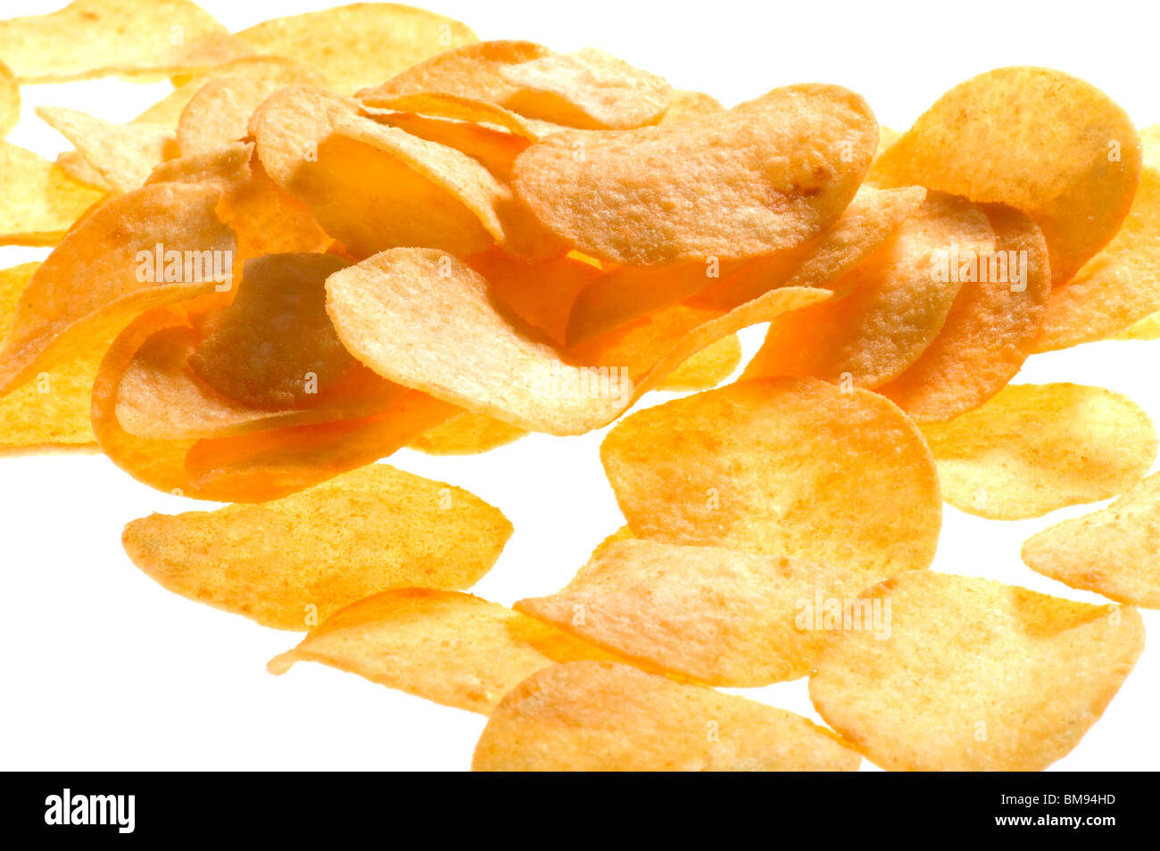 Golden potato chips in Cut Out Stock Images & Pictures - Alamy