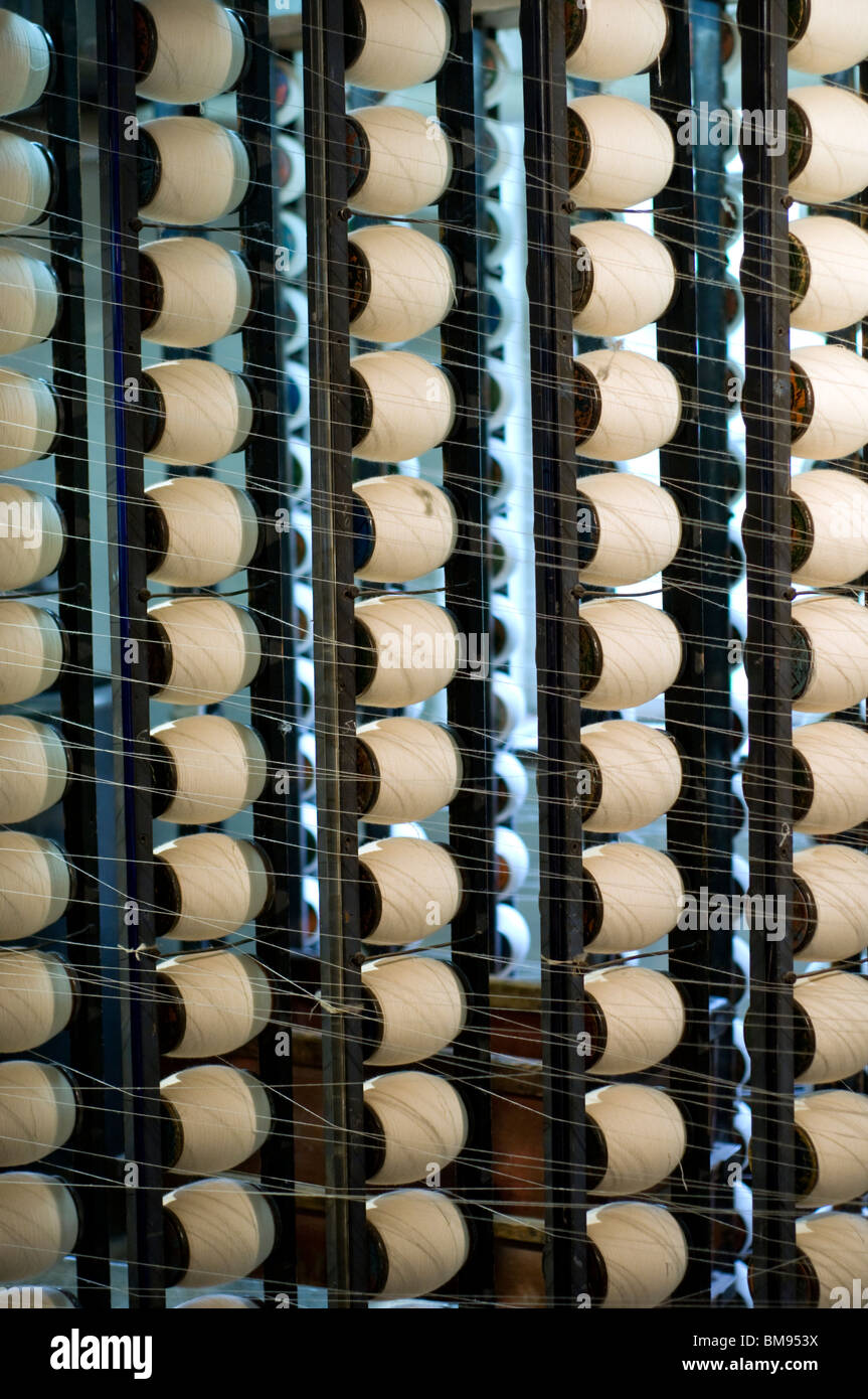 Cotton reels inside Quarry Bank Mill in Styal, Cheshire, England, UK ...