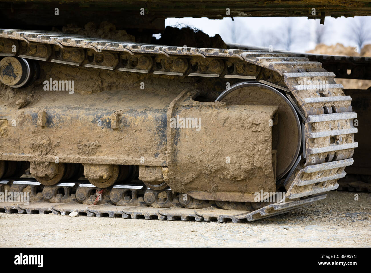 Chain drive of a Caterpillar hydraulic excavator Stock Photo - Alamy