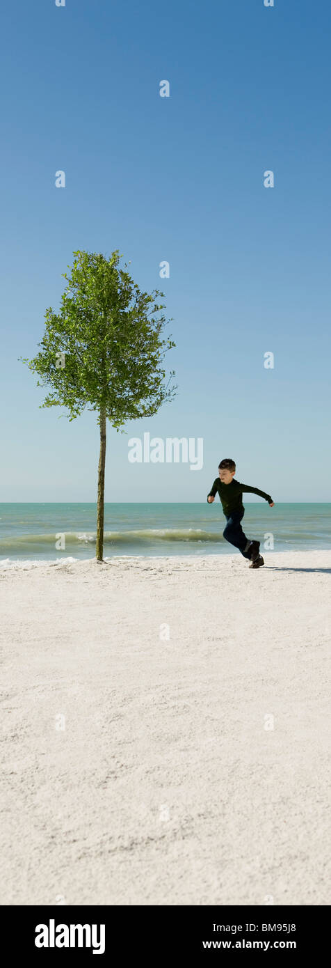 Boy Running Out Of Sea High Resolution Stock Photography and Images - Alamy