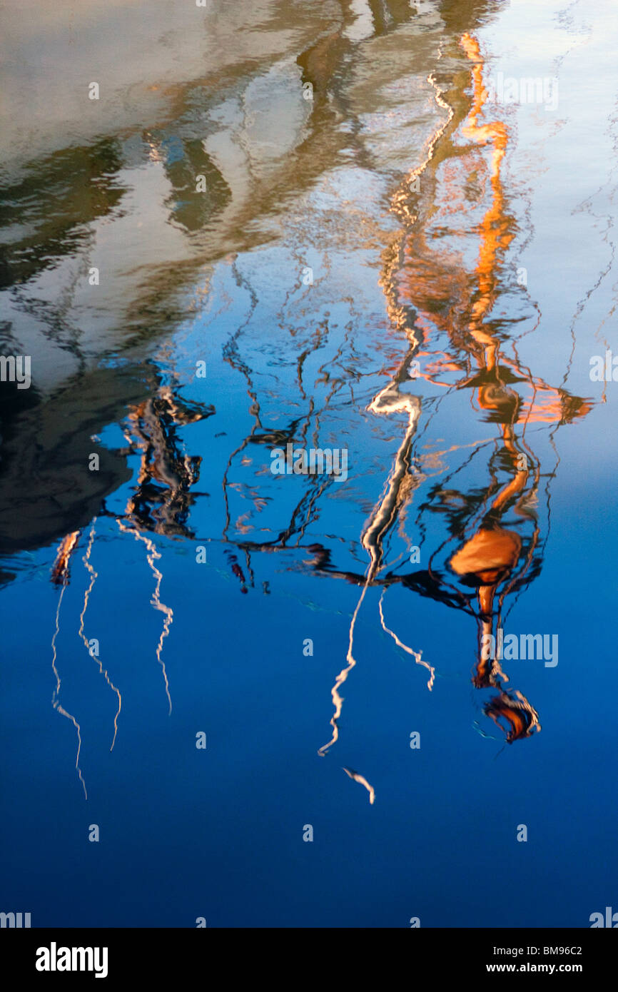 Abstract Reflection of Fishing Boat in Ocean Stock Photo - Alamy