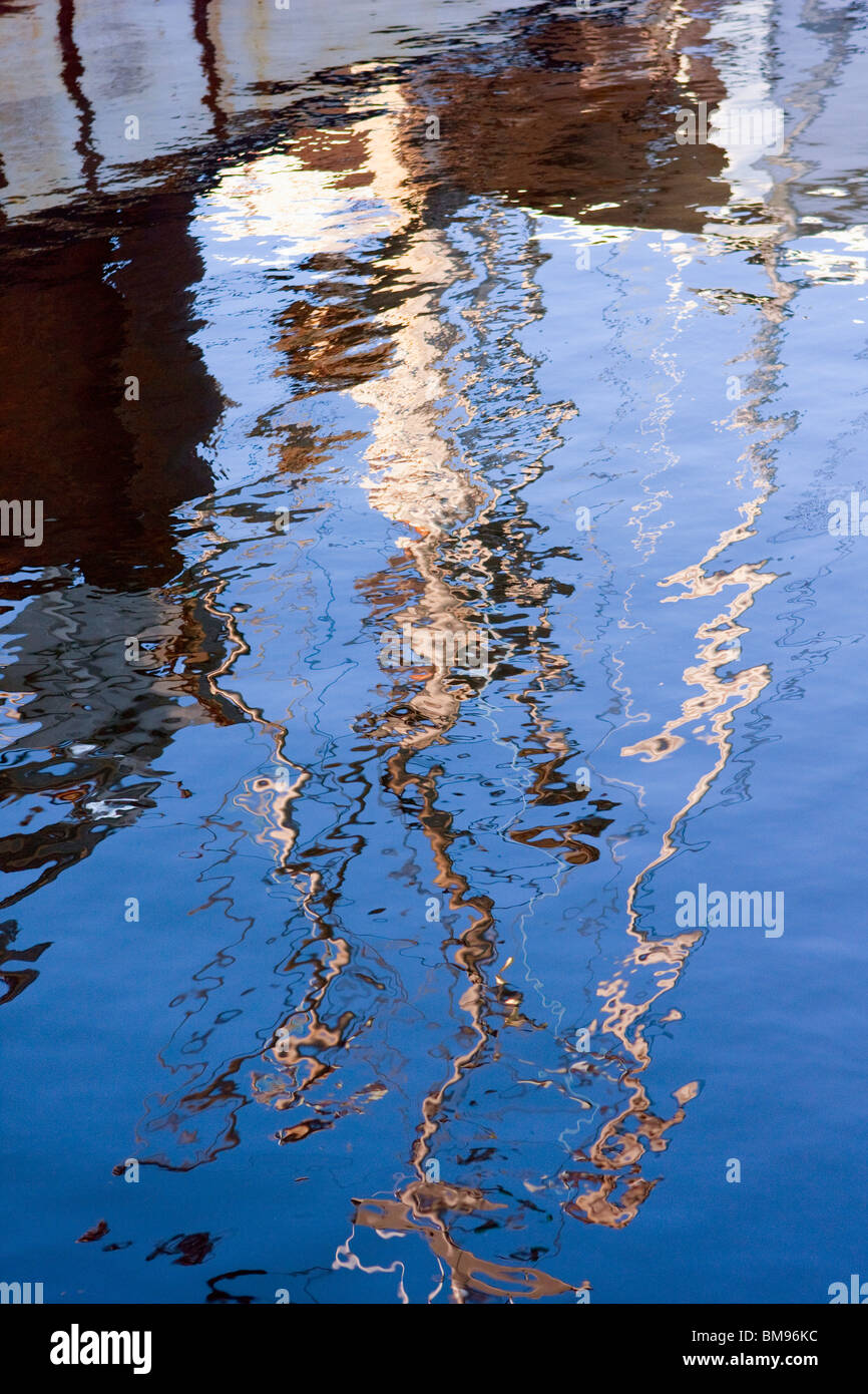 Abstract Reflection of Fishing Boat in Ocean Stock Photo - Alamy