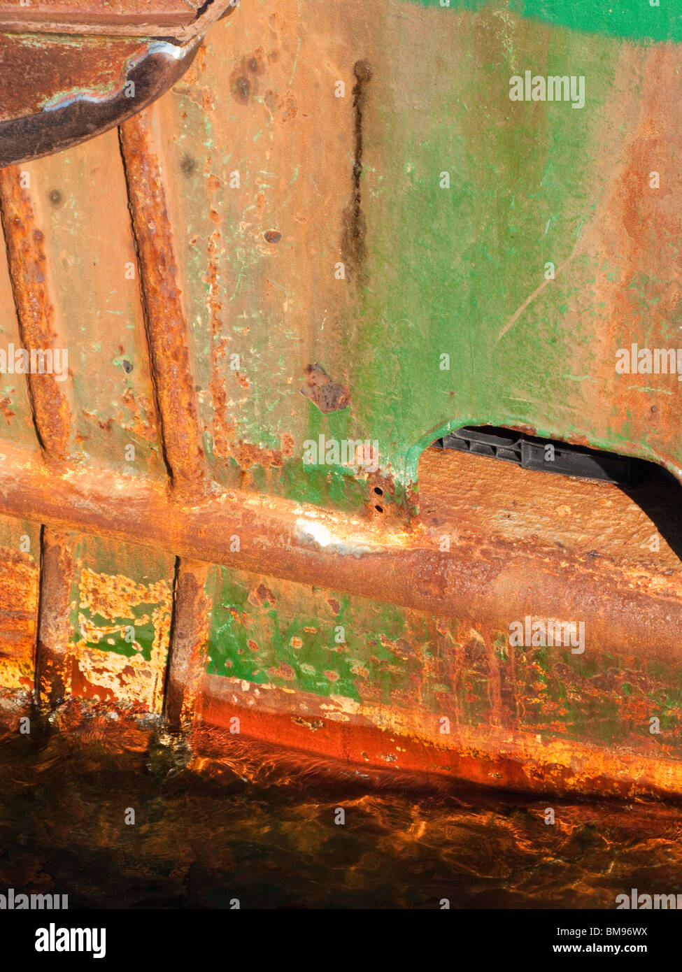Abstract Rusty Red, Orange and Green Bow of Boat with Barnacles Stock ...