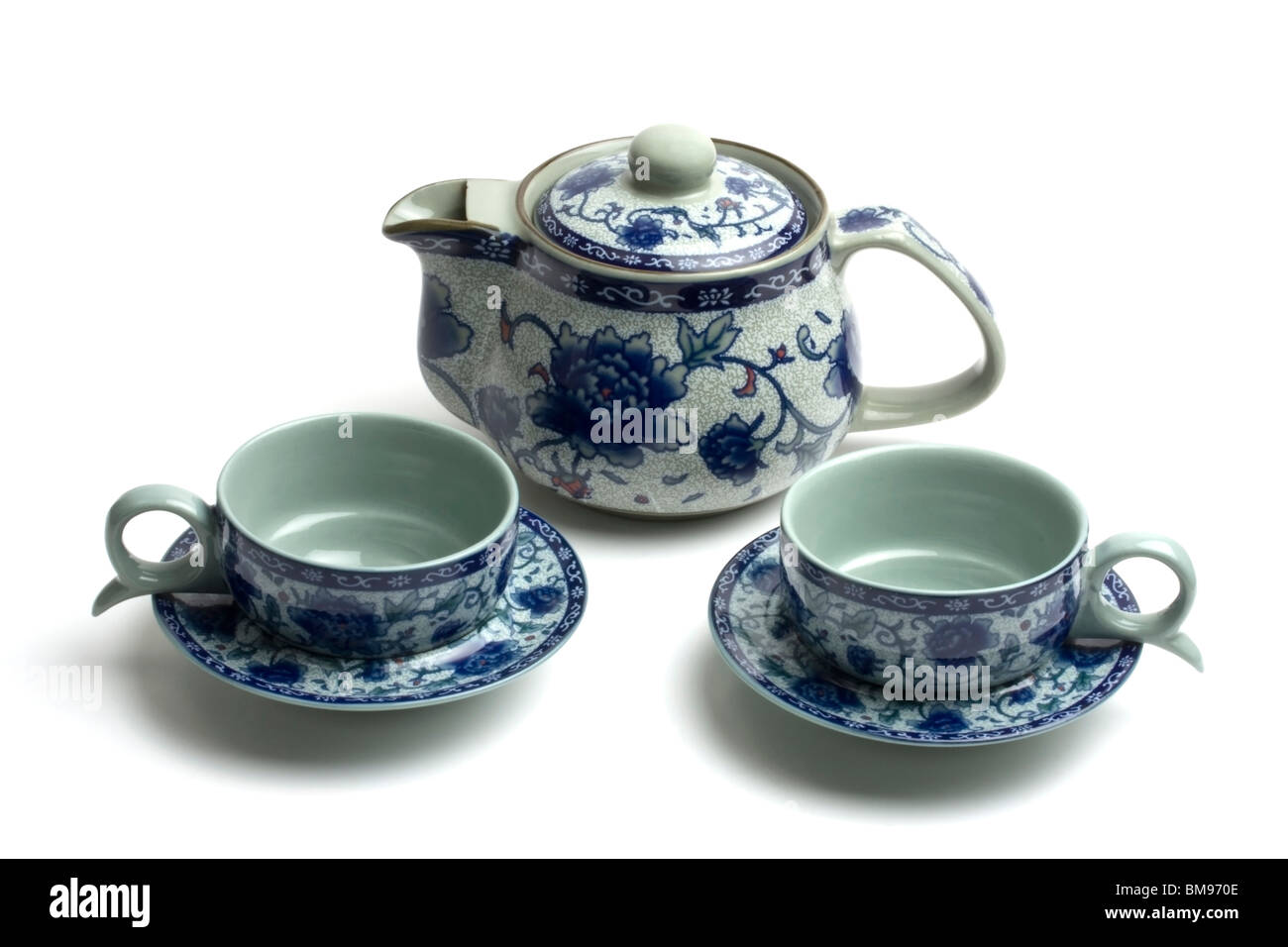 Chinese tea set with pot and cups isolated on white Stock Photo - Alamy