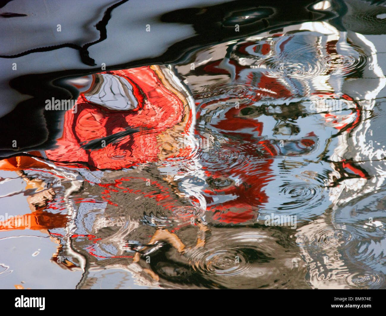Abstract Reflection of Fishing Boat in Ocean Stock Photo - Alamy