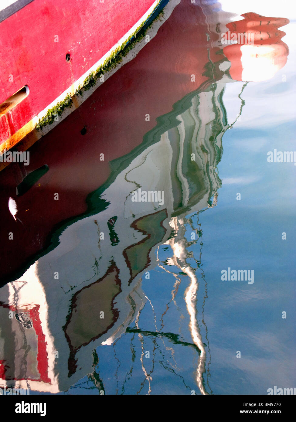 Abstract Reflection of Fishing Boat in Ocean Stock Photo - Alamy