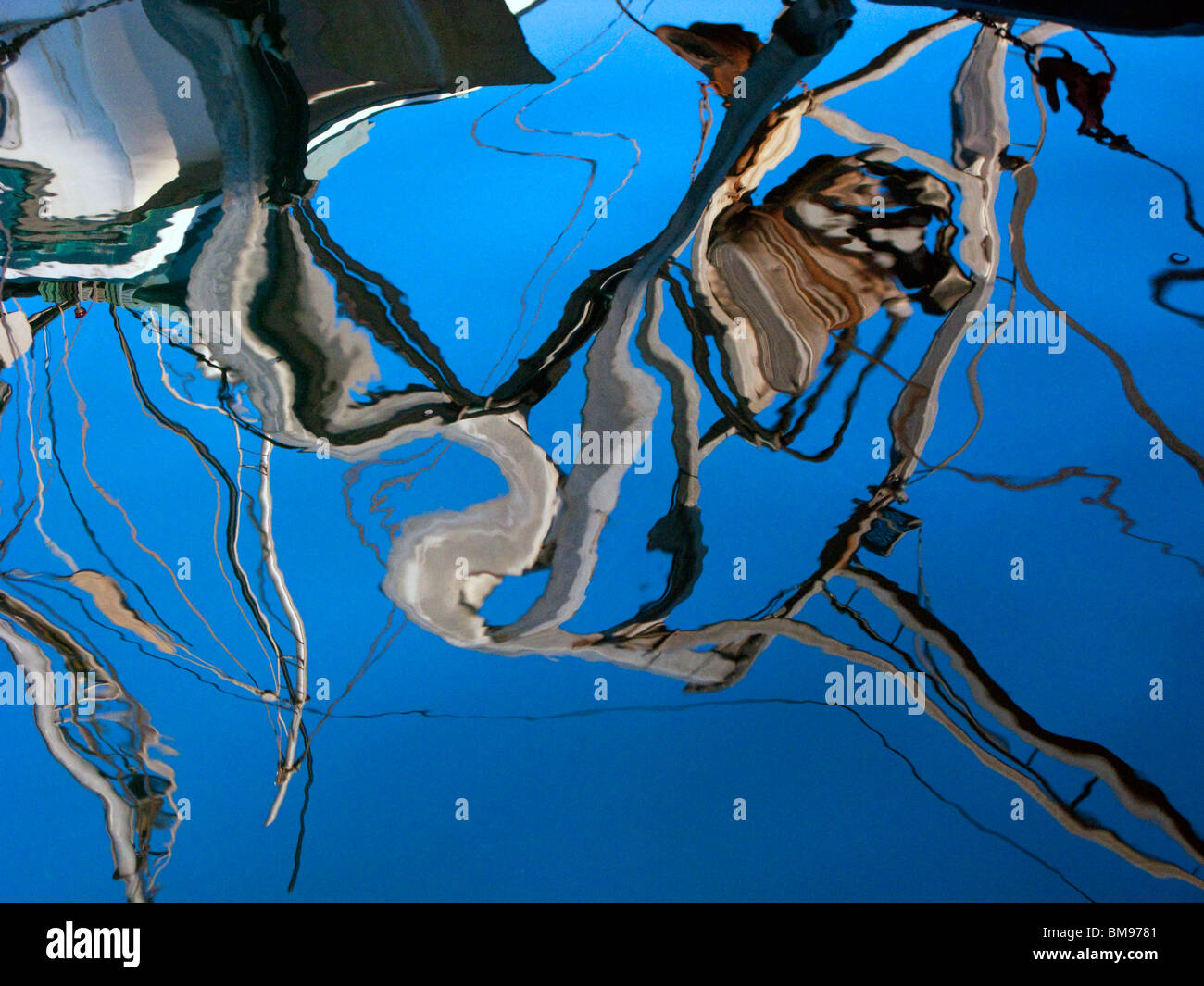 Abstract Reflection of Fishing Boat in Ocean Stock Photo - Alamy