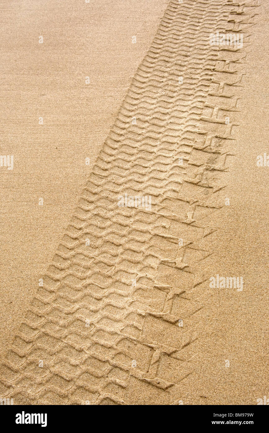Tire Tracks In The Sand Stock Photo - Alamy