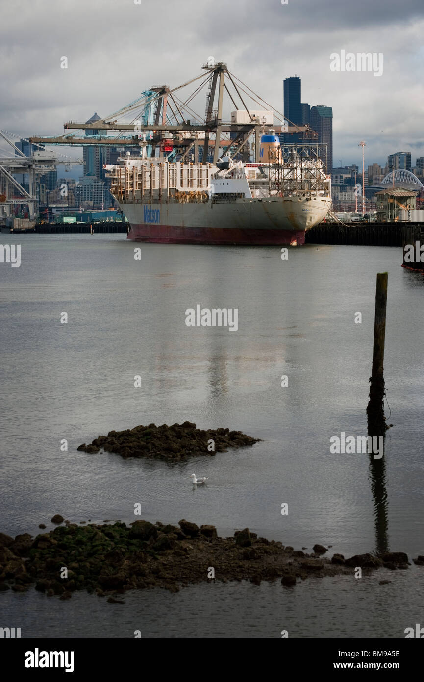 Port of Seattle, Seattle, Washington, USA. Cargo ships are loaded with ...