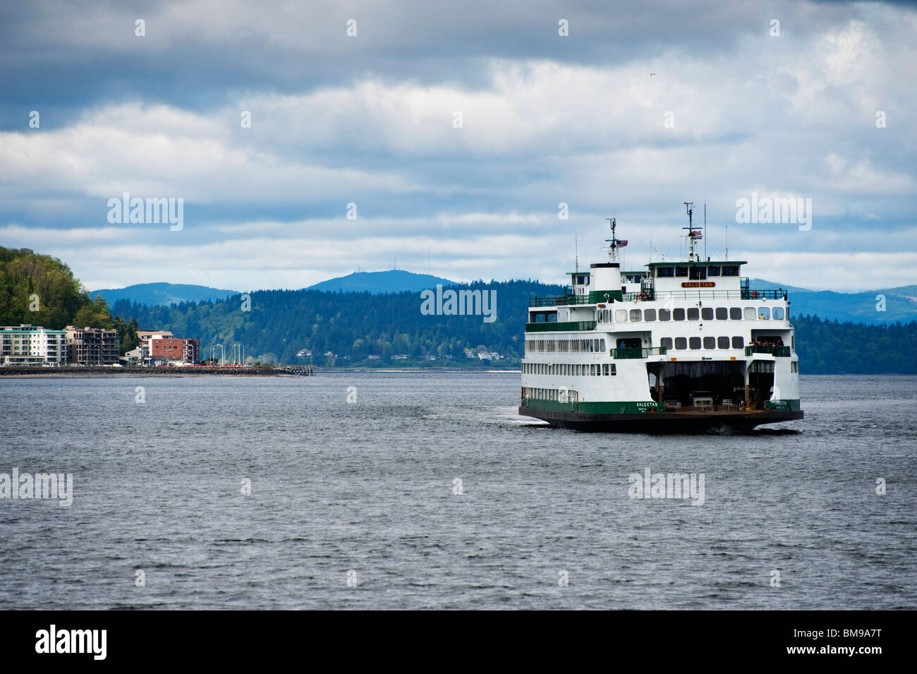 A Washington State Ferry boat sails into the Elliott Bay ferry terminal ...