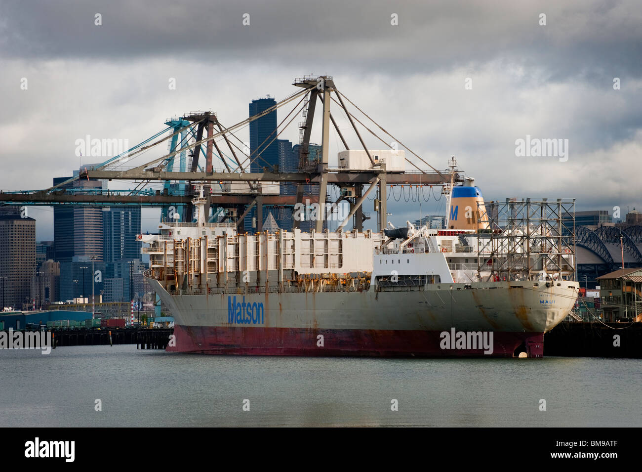 Port of Seattle, Seattle, Washington, USA. Cargo ships are loaded with ...