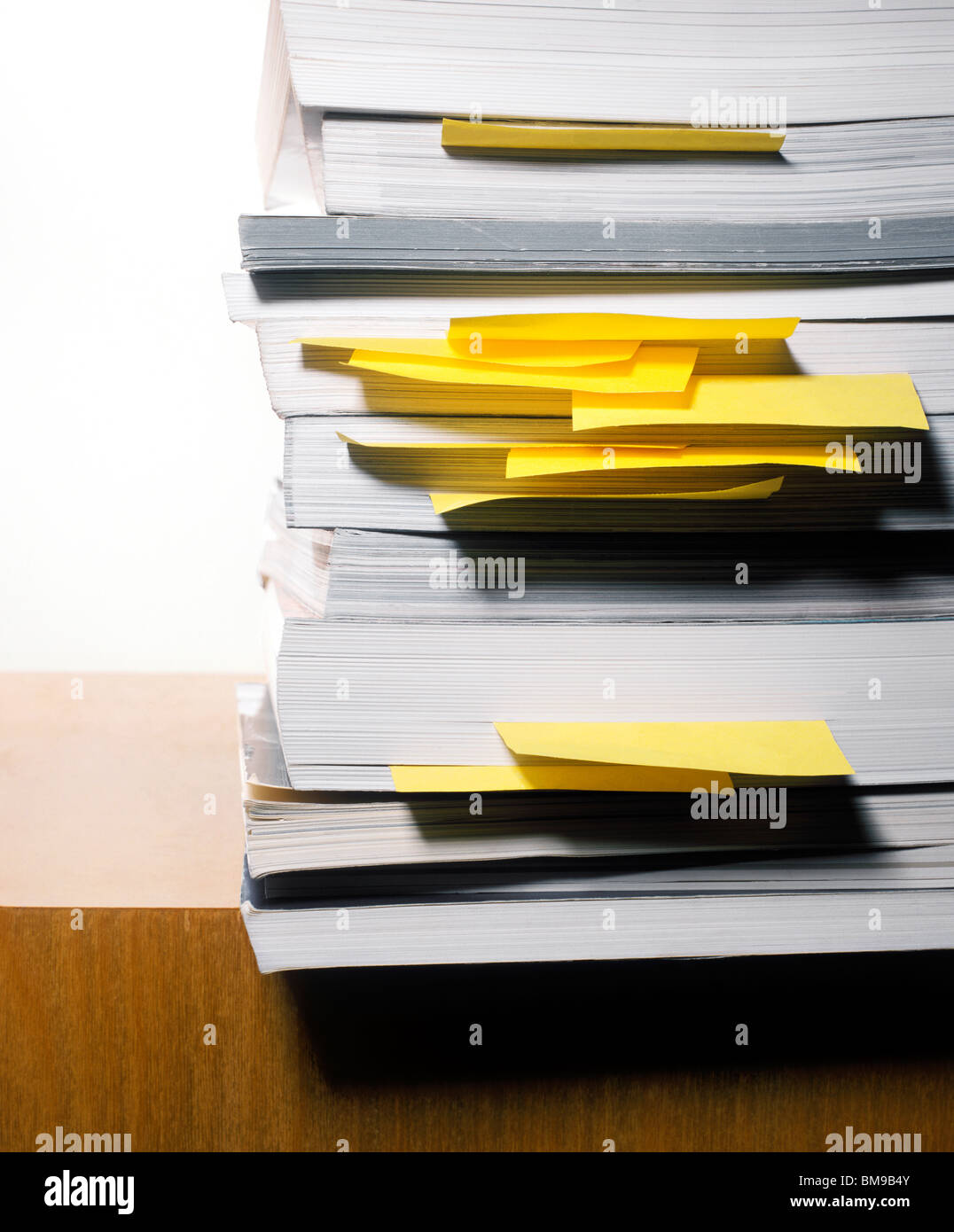 Stack of books with post-it or sticky notes Stock Photo - Alamy
