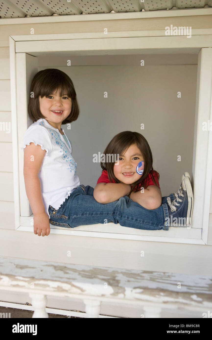 Seated female with children hi-res stock photography and images - Alamy