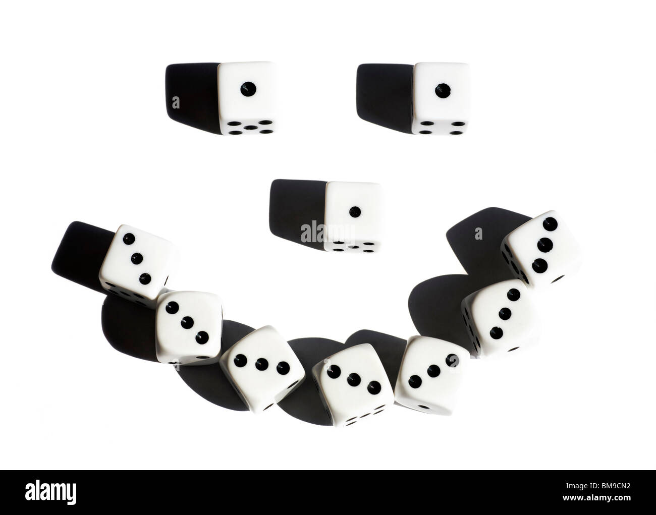 Dice Forming A Happy Face Stock Photo - Alamy
