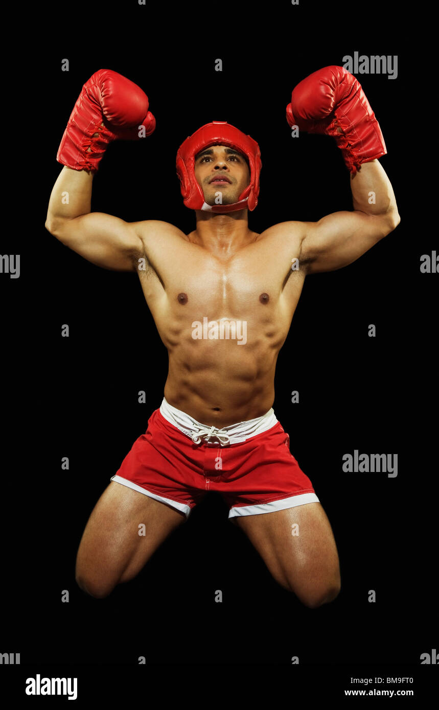 Close-up of a male boxer flexing muscles Stock Photo - Alamy