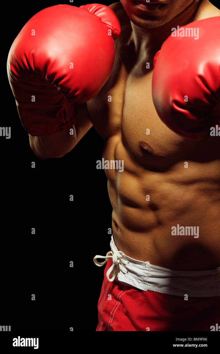 Male boxer in fighting stance Stock Photo - Alamy
