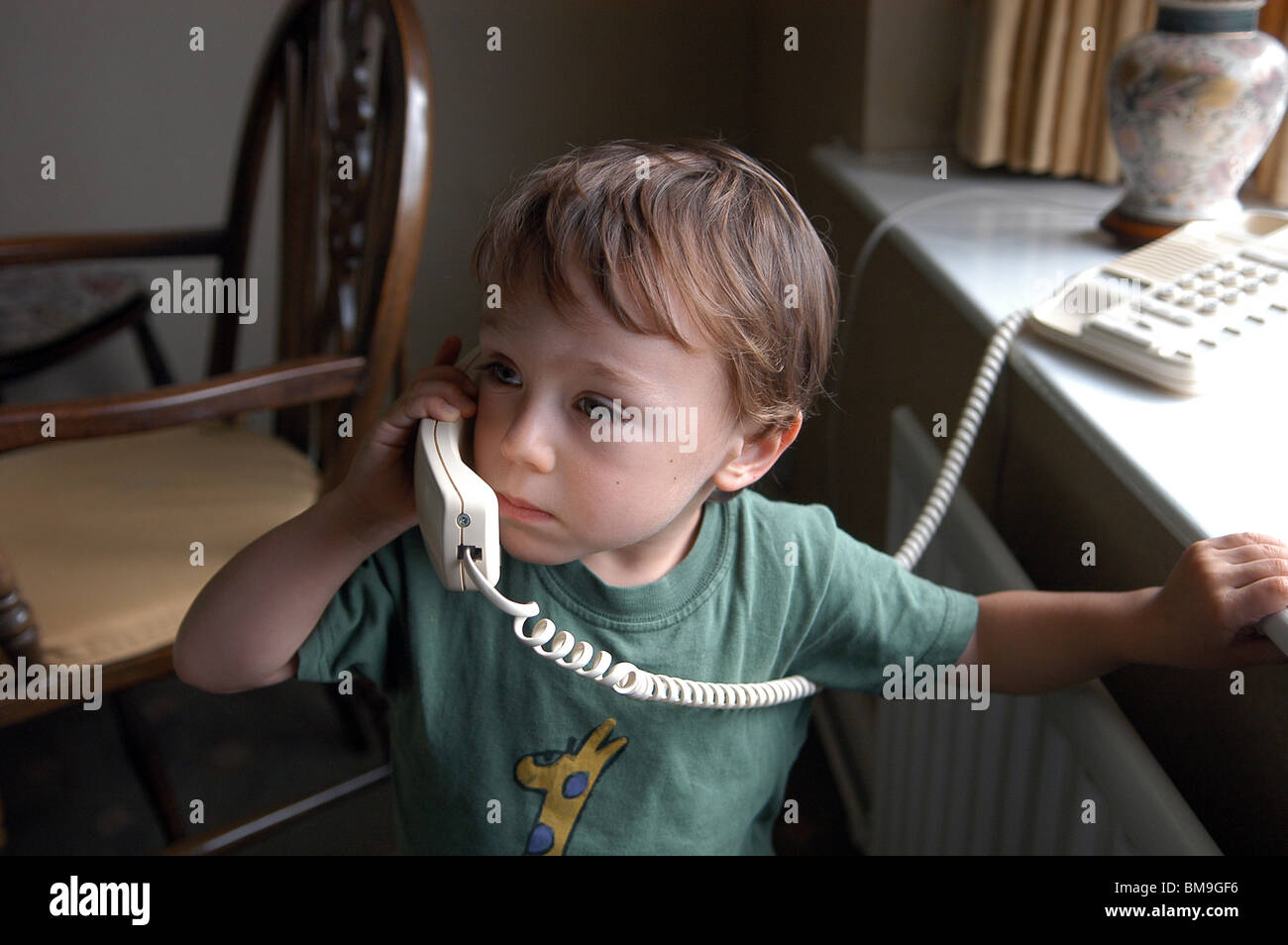 young child on telephone Stock Photo - Alamy