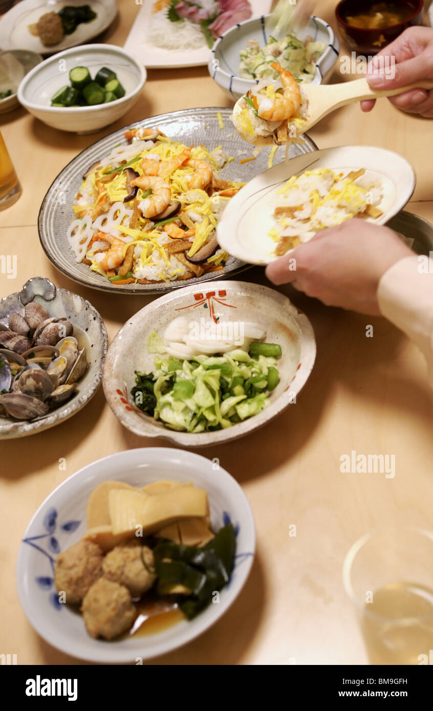 People eating Japanese food Stock Photo - Alamy
