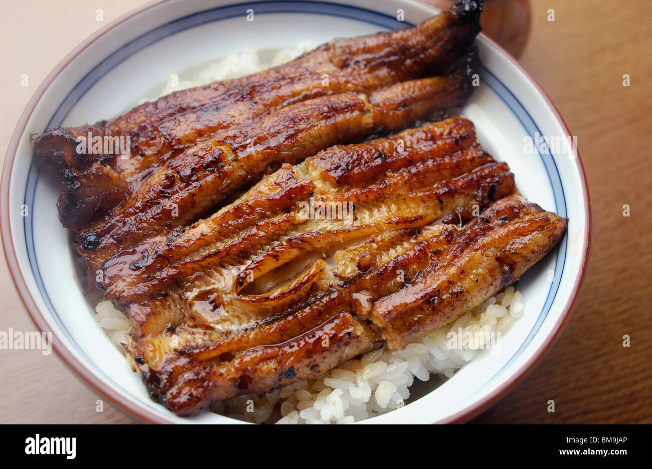 Bowl of grilled eel on rice, close up Stock Photo - Alamy