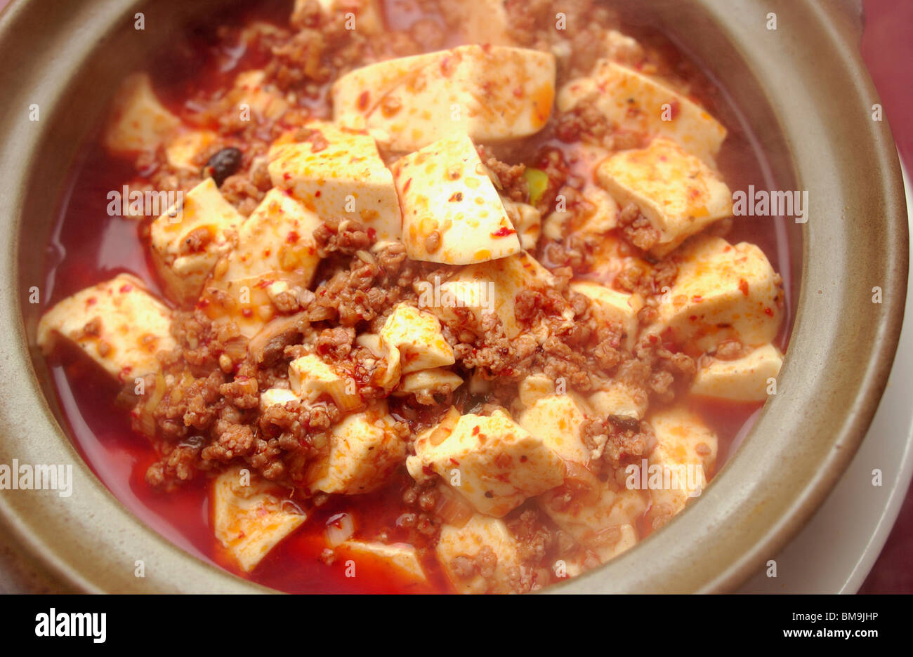 Tofu and minced meat cooked with chili sauce, close up Stock Photo - Alamy