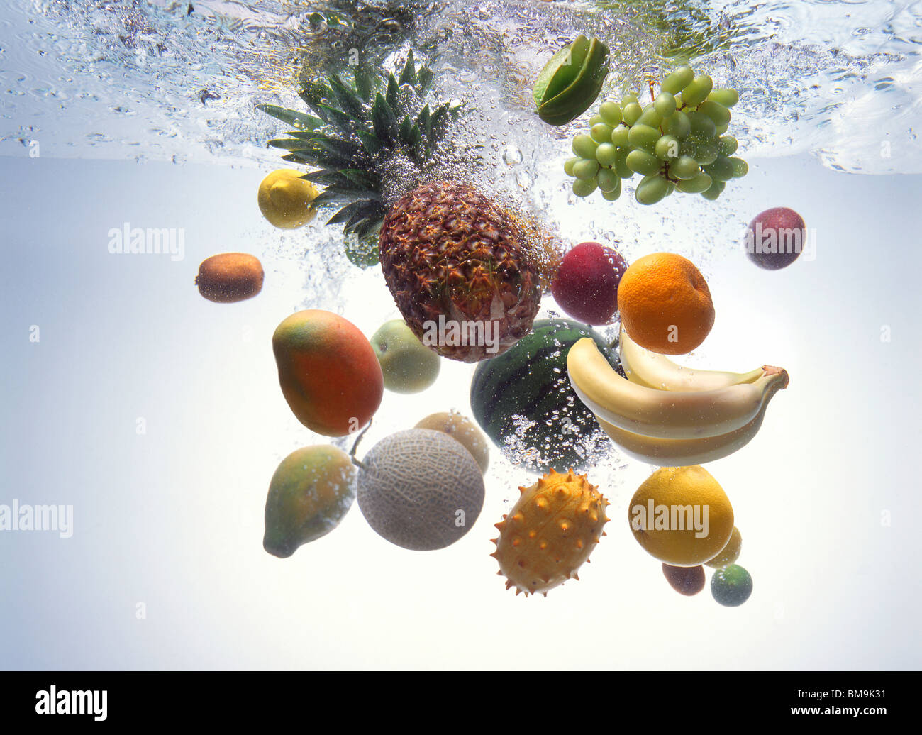 Fruit dropping in water hi-res stock photography and images - Alamy