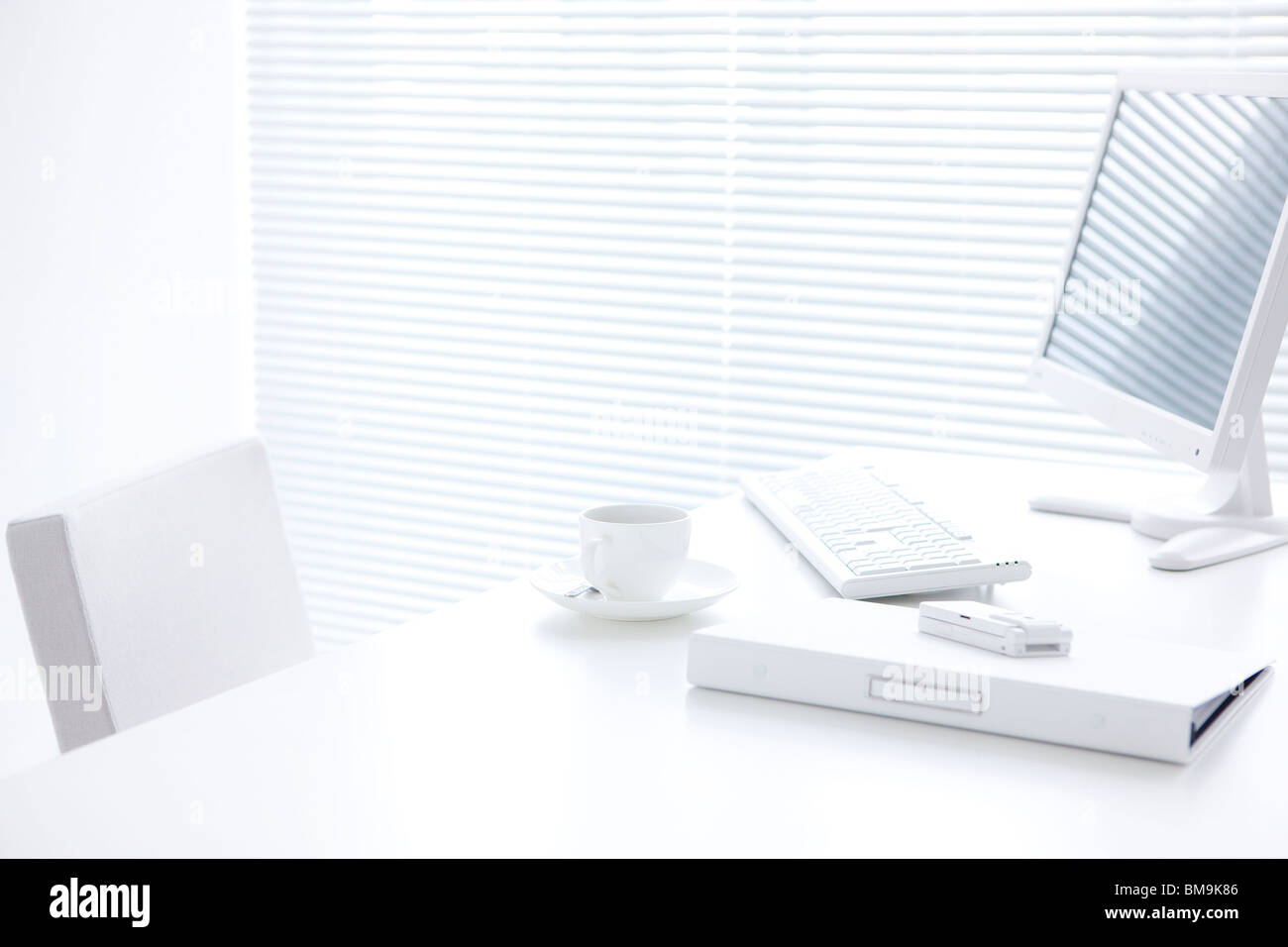Computer and coffee cup on desk Stock Photo - Alamy