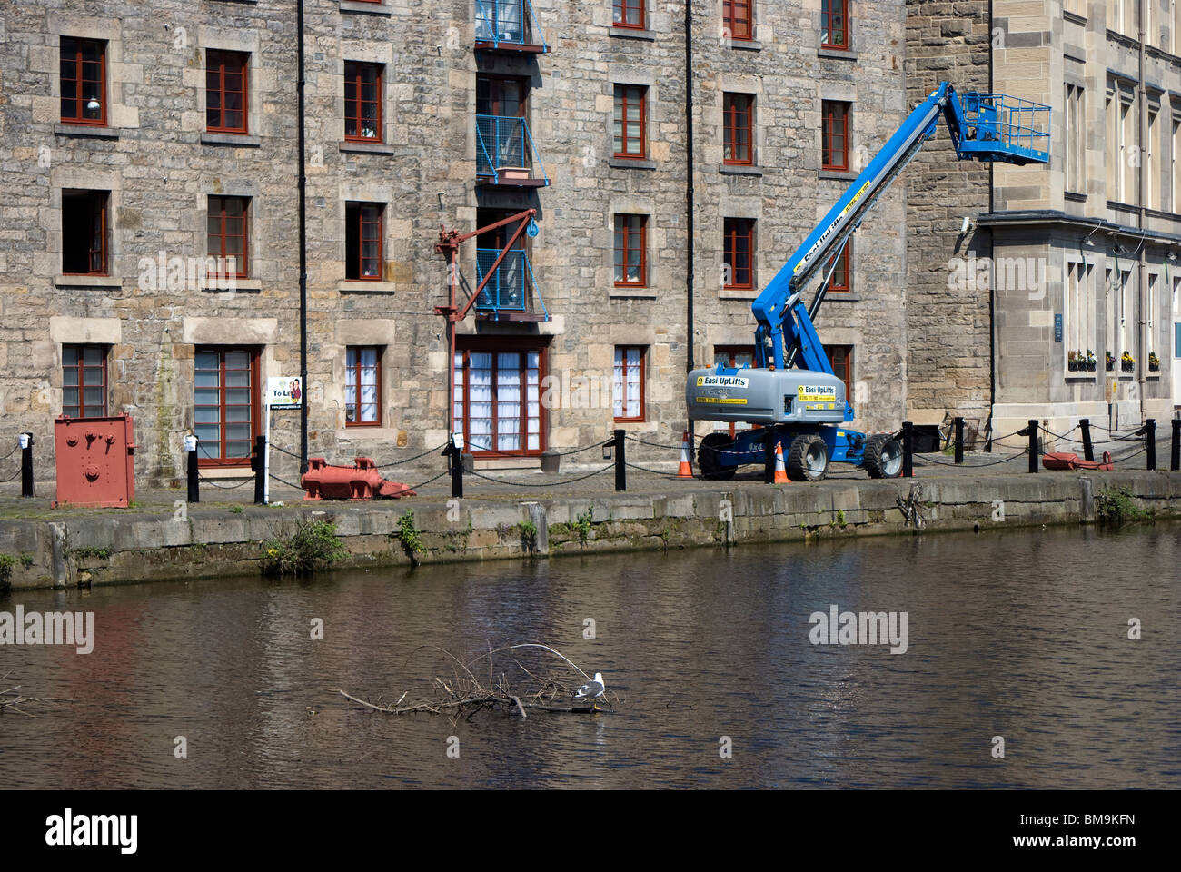 Cherry picker hoist outside a converted mill at Leith, Edinburgh ...