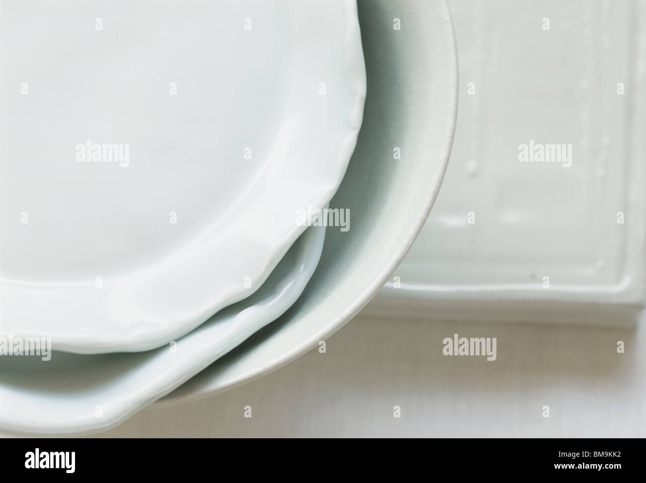 Stacked ceramic plates Stock Photo - Alamy