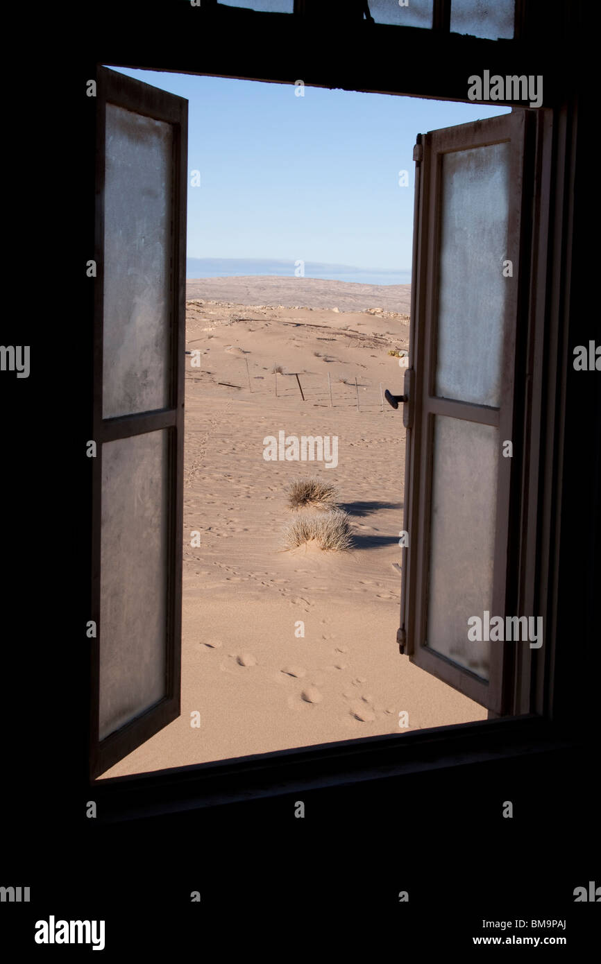Looking out into the desert through an old dusty window Stock Photo - Alamy
