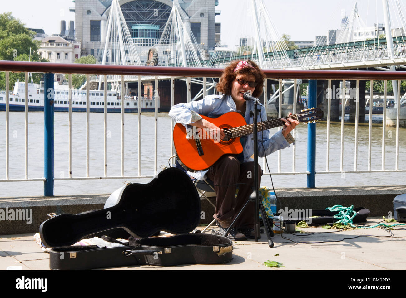 Woman Playing Guitar Singing Busking High Resolution Stock Photography ...
