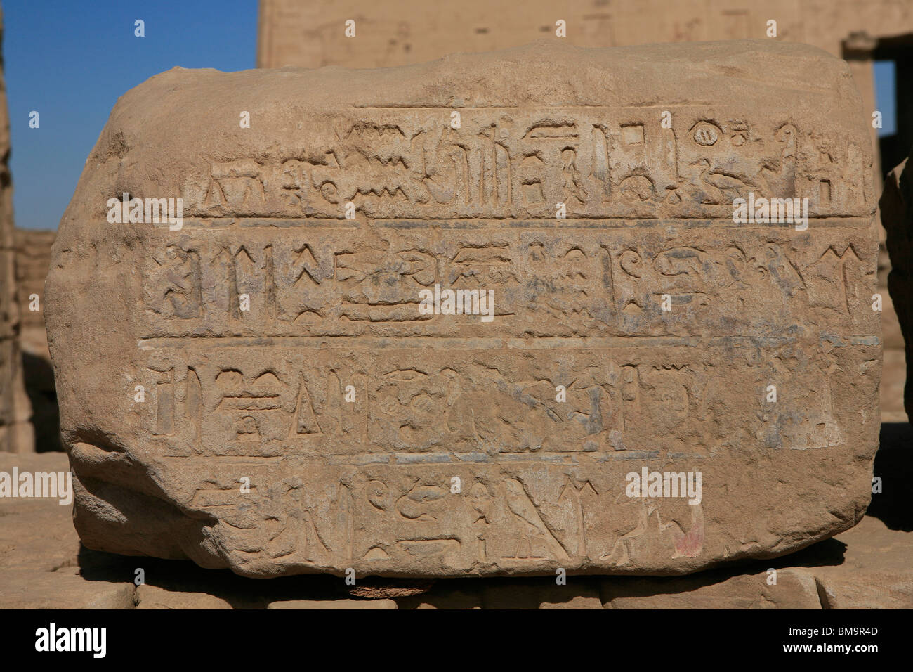 Hieroglyphs on a stone slab outside the Temple of Horus in Edfu, Egypt ...
