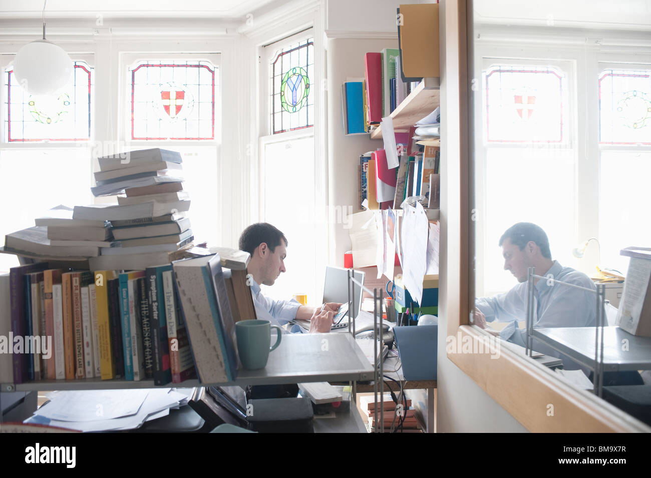 Cluttered with furniture hi-res stock photography and images - Alamy