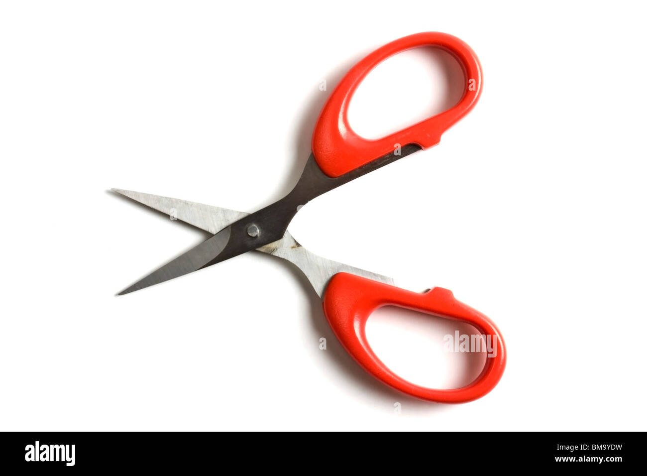 Red scissors isolated on white background Stock Photo - Alamy