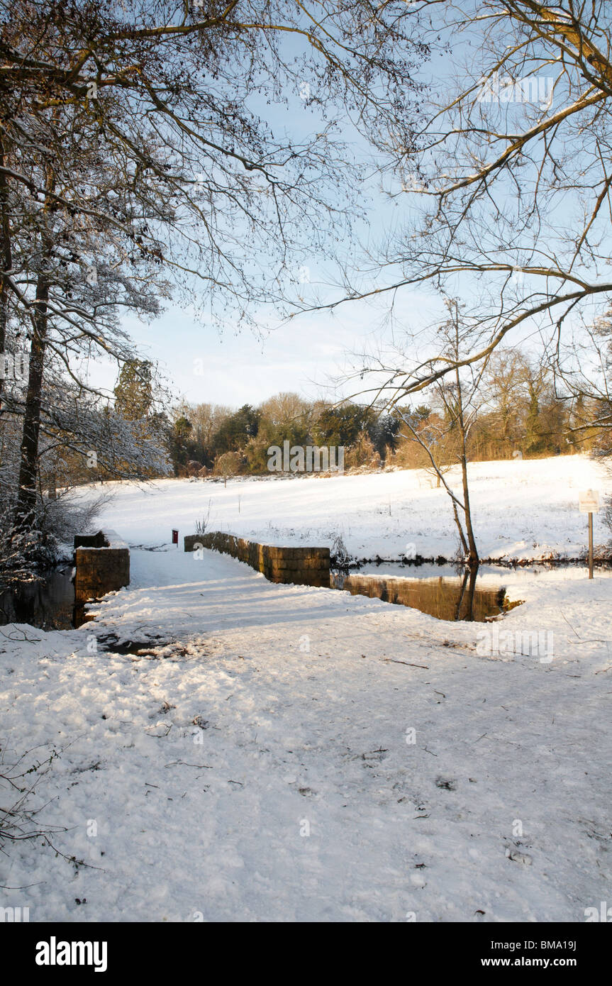 A footpath over a bridge covered in snow Stock Photo - Alamy