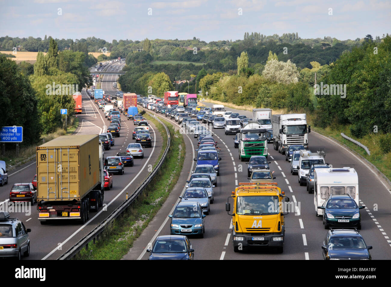 Aerial view slow moving car & lorry truck traffic in queues in both ...