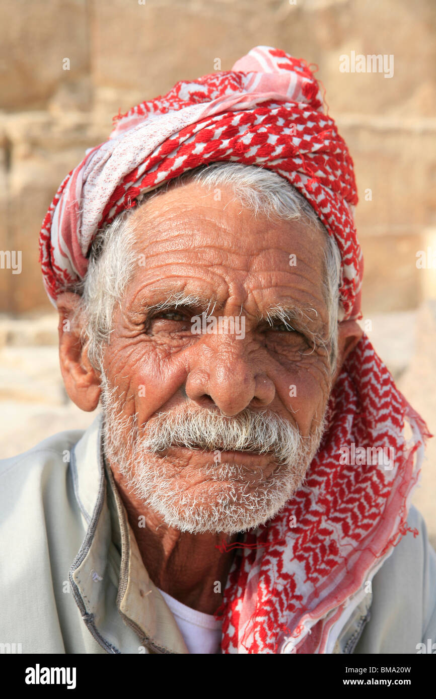 Close-up of an Egyptian man in traditional attire in front of the ...