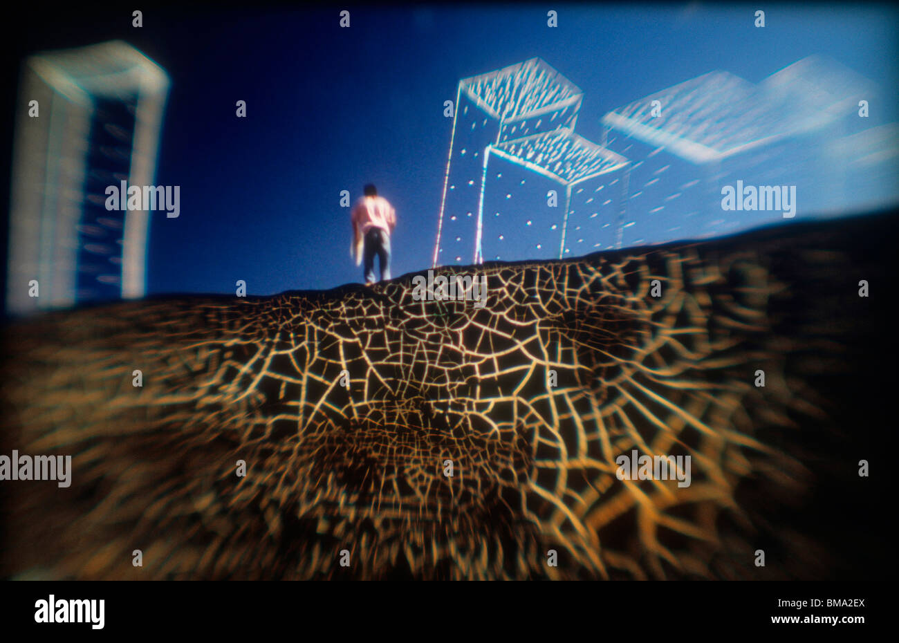 Man wanders in surreal landscape Stock Photo - Alamy