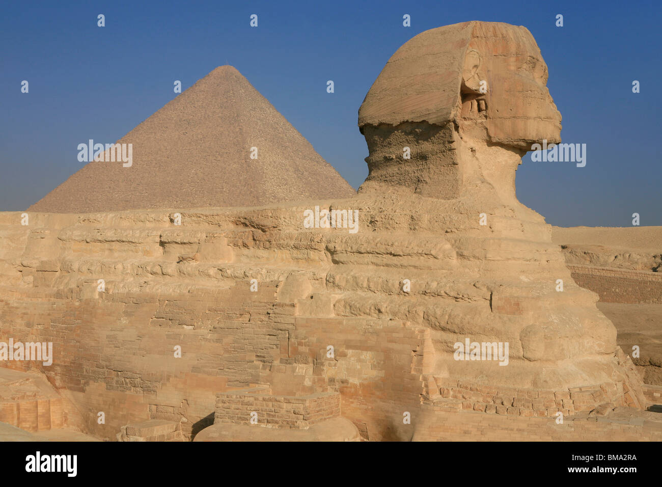 The Great Sphinx of Giza with the Great Pyramid of Cheops in the ...