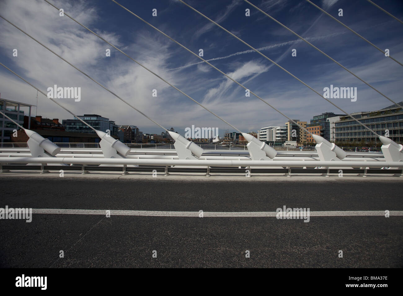 The Samuel Beckett Bridge spanning the River Liffey in Dublin, Ireland ...
