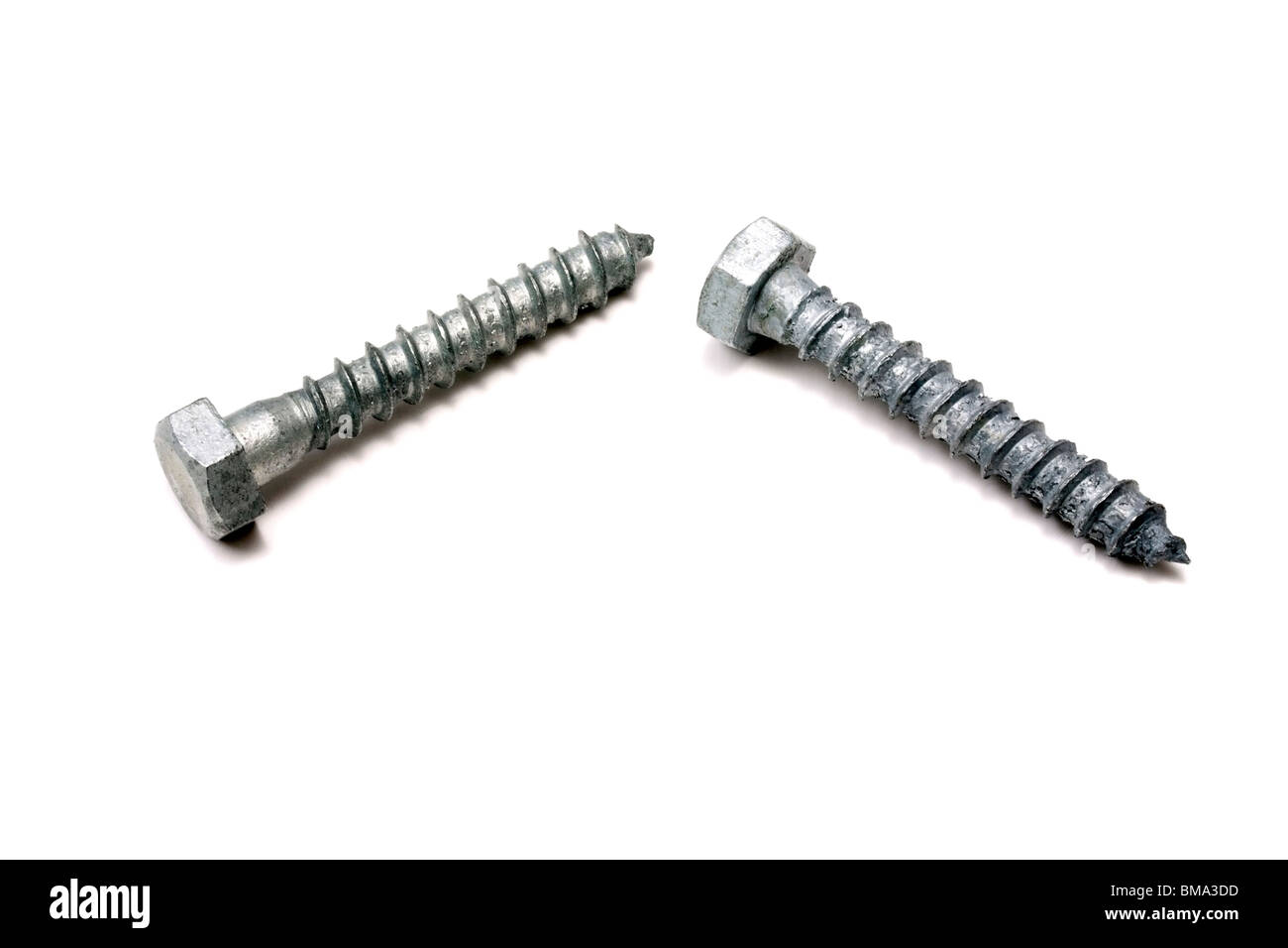 A pair of screws isolated on white Stock Photo - Alamy
