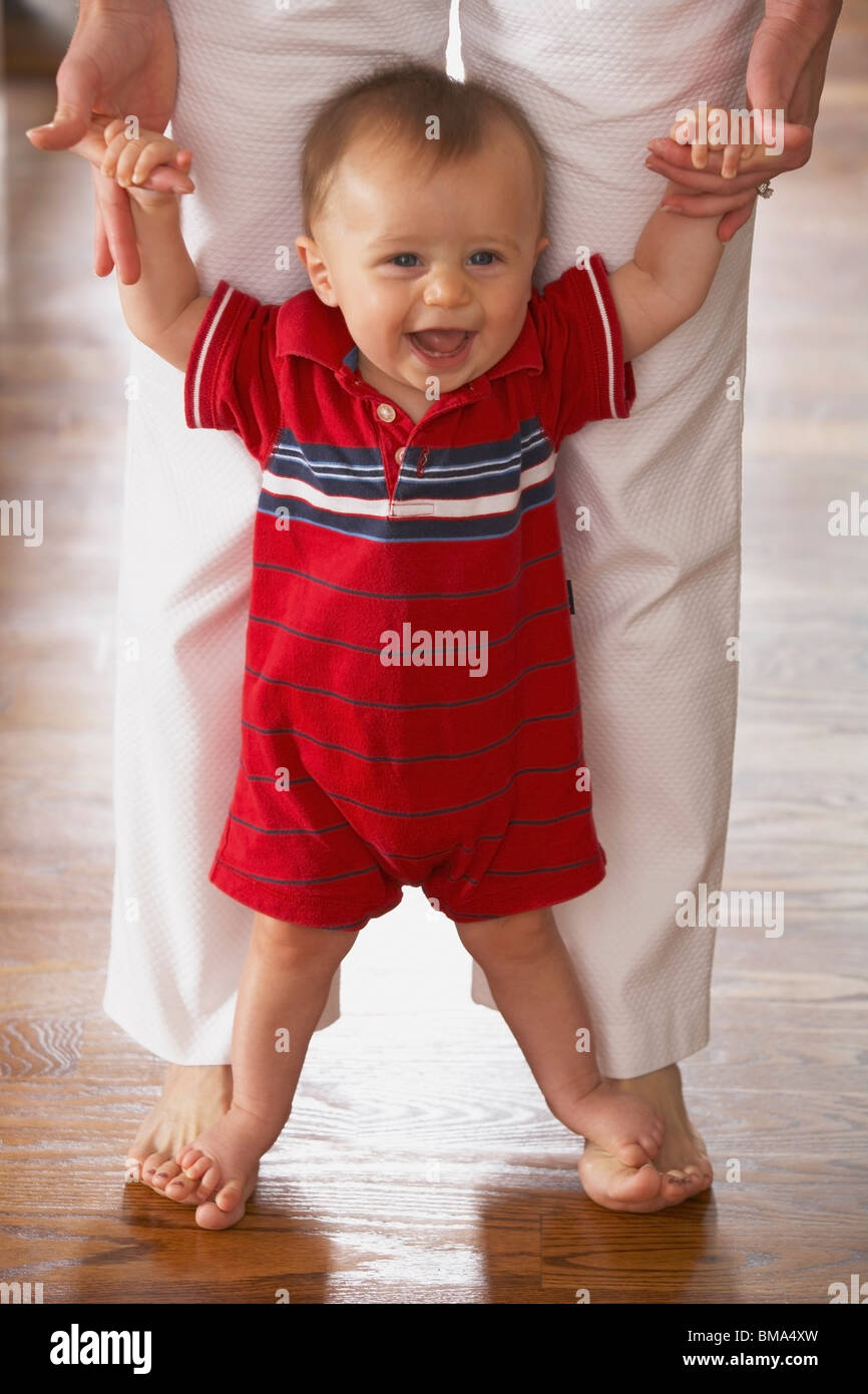 Female standing feet together hands hi-res stock photography and images ...